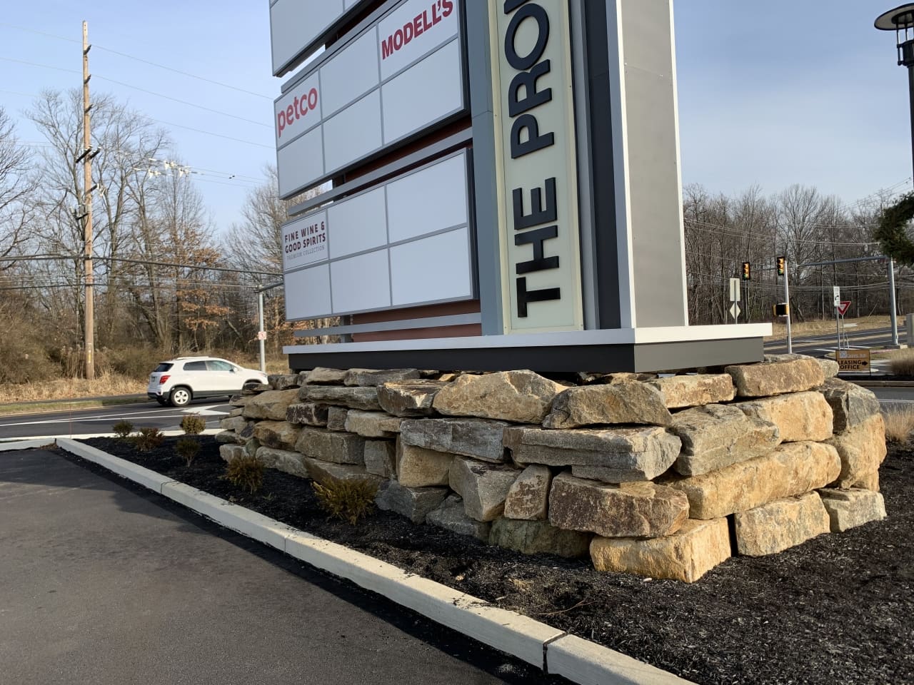 Shopping Center Monument Sign with Stacked Fieldstone Base